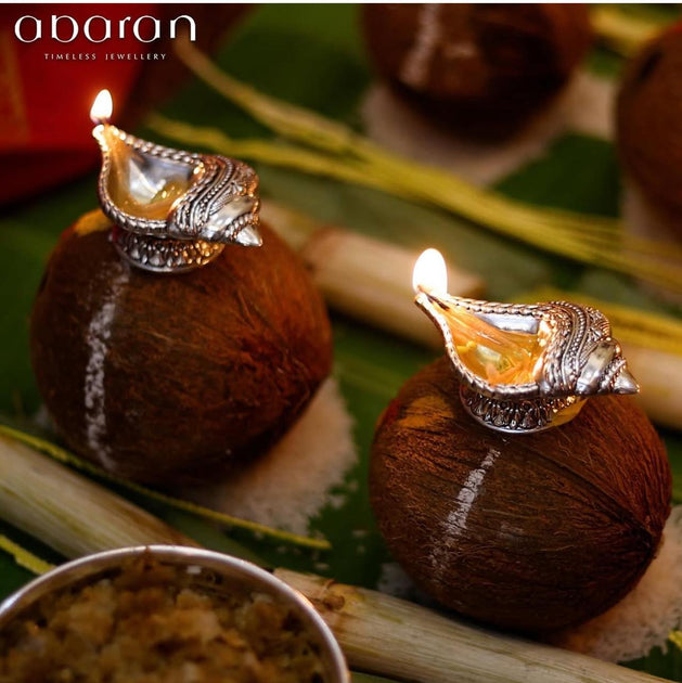 Silver conch shaped diya (Pair) – Abaran Timeless Jewellery Pvt.Ltd